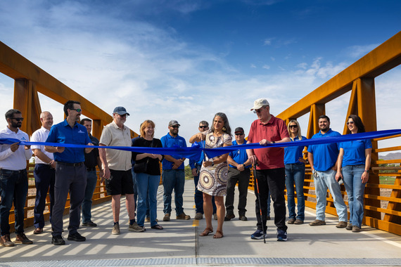 County dedicates new pedestrian bridge along The Loop