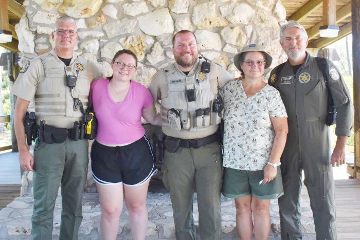 Gulf Shores resident meets with FWC officers after rescue at sea